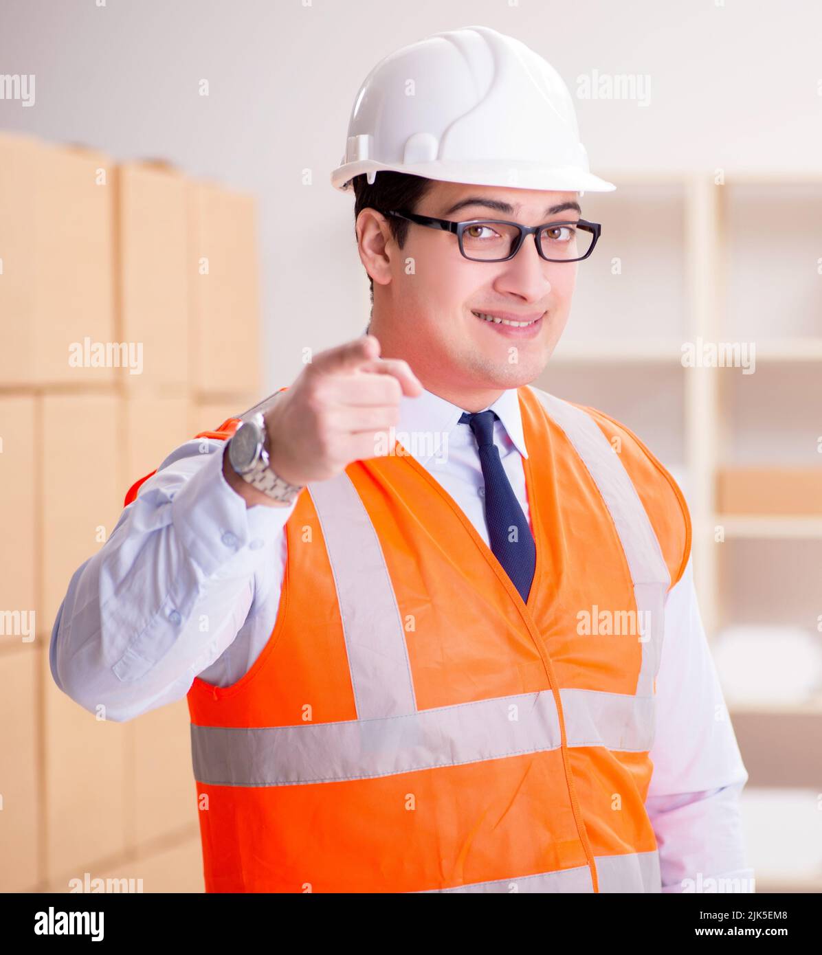 The man working in postal parcel delivery service office Stock Photo ...