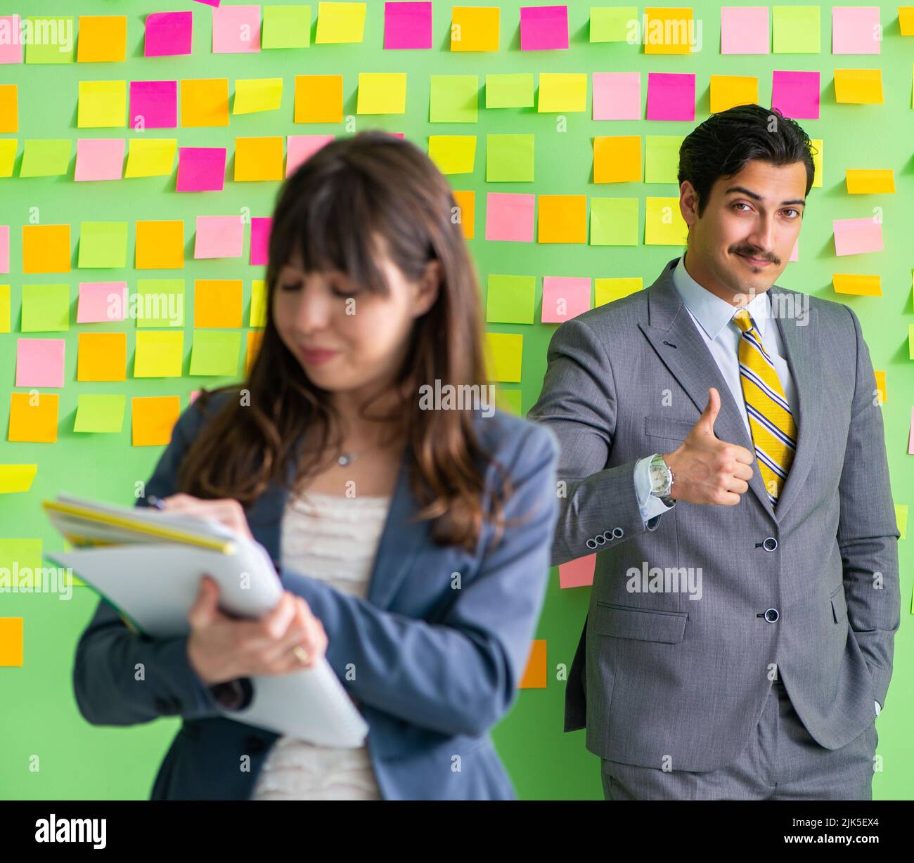 The business colleagues discussing future priorities Stock Photo - Alamy
