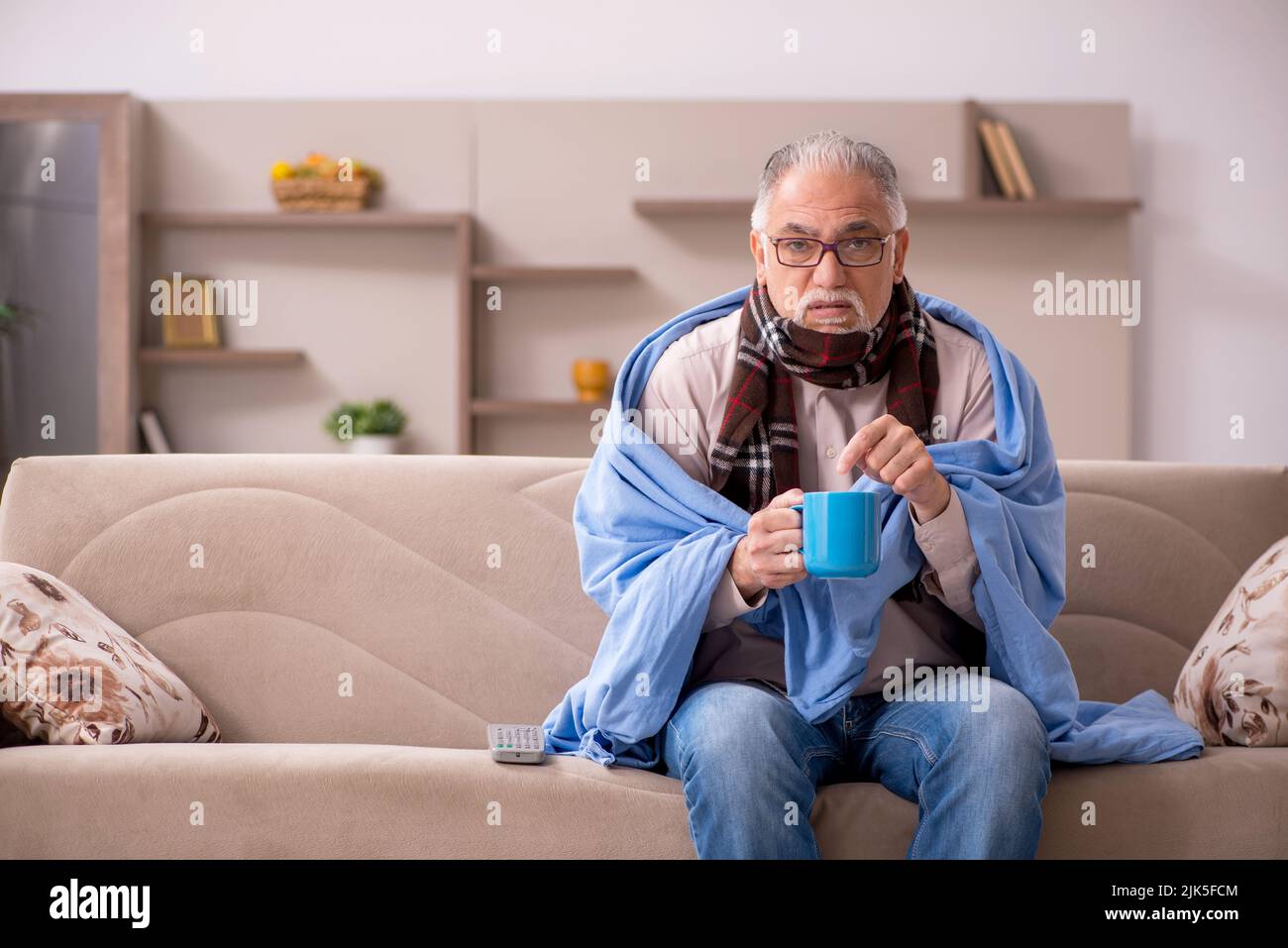 Sick old man coughing sitting hi-res stock photography and images - Alamy