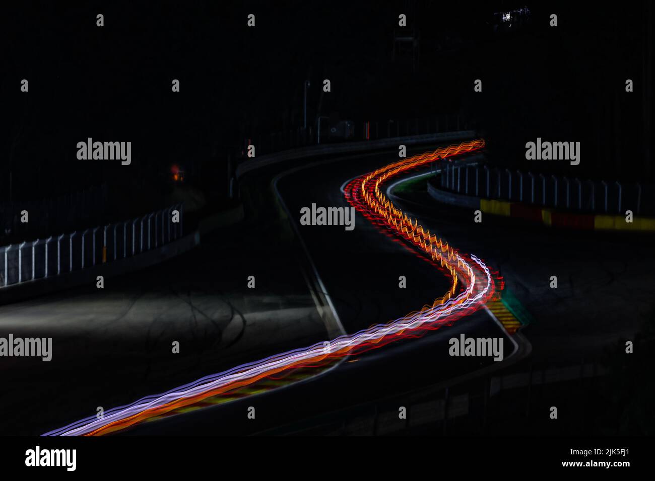 Cars in action by night, raidillon, during the TotalEnergies 24 hours ...