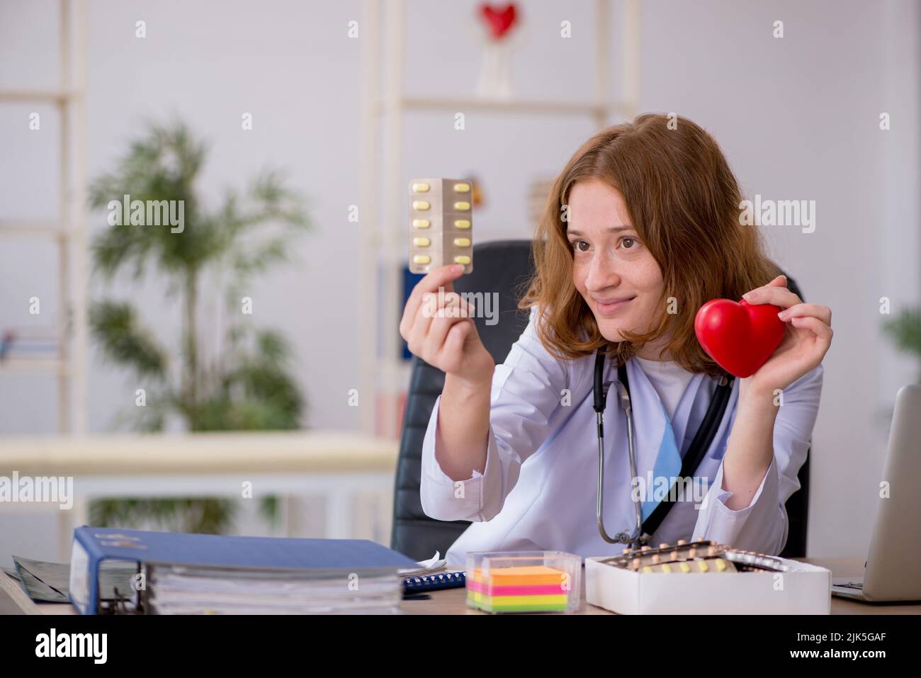 Young female doctor cardiologist working at the hospital Stock Photo ...