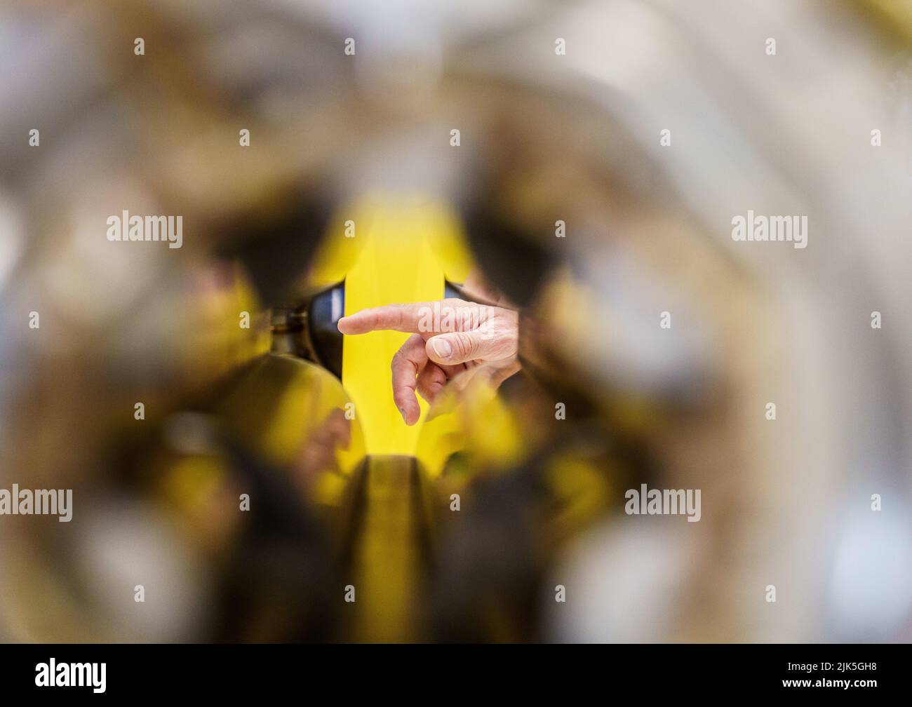 Darmstadt, Germany. 20th July, 2022. A man works on a component for the ...