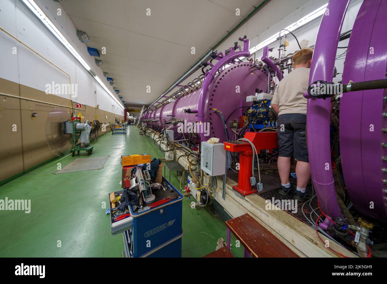 Darmstadt, Germany. 20th July, 2022. A man works at the linear ...
