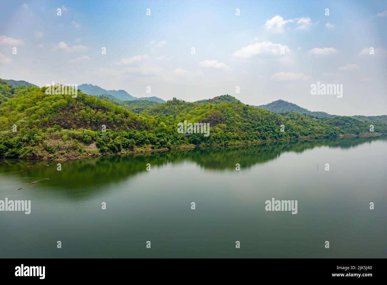 green mountain with river water reflection at morning from flat angle ...