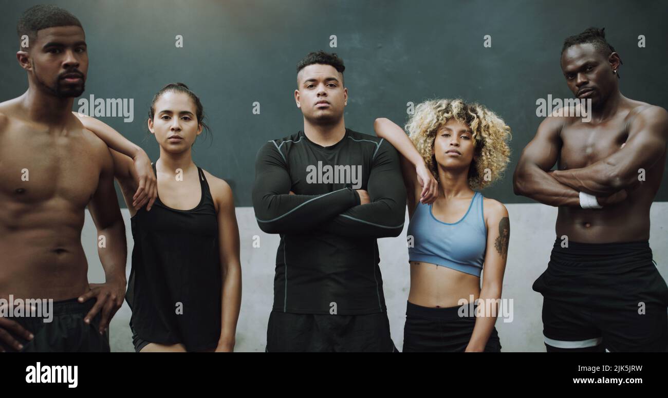 Our squad are the strongest out there. Portrait of a group of sporty ...