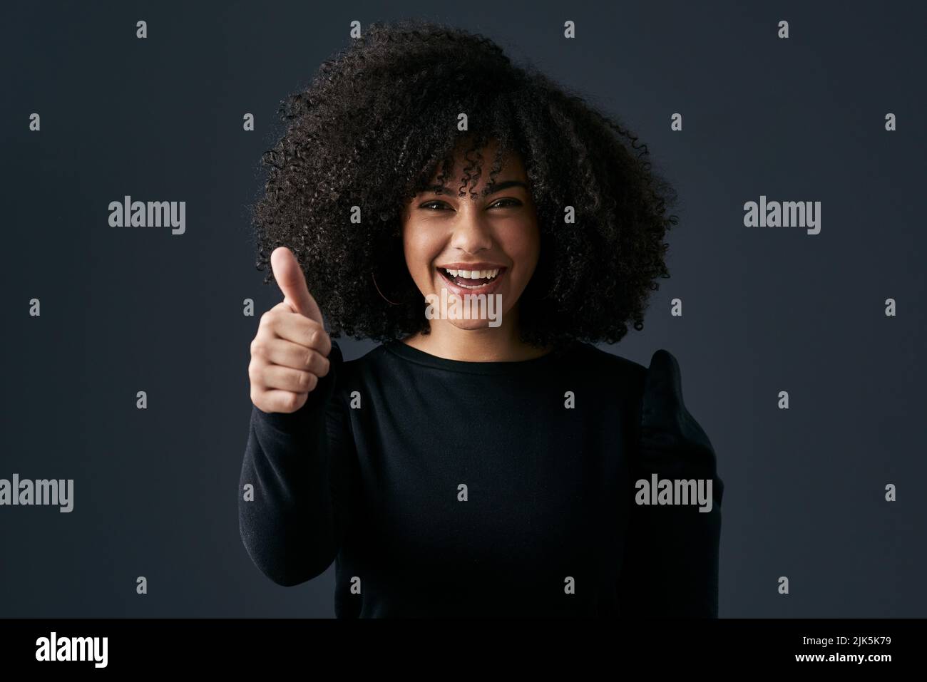 Always give it your best shot. a young businesswoman giving the thumbs ...