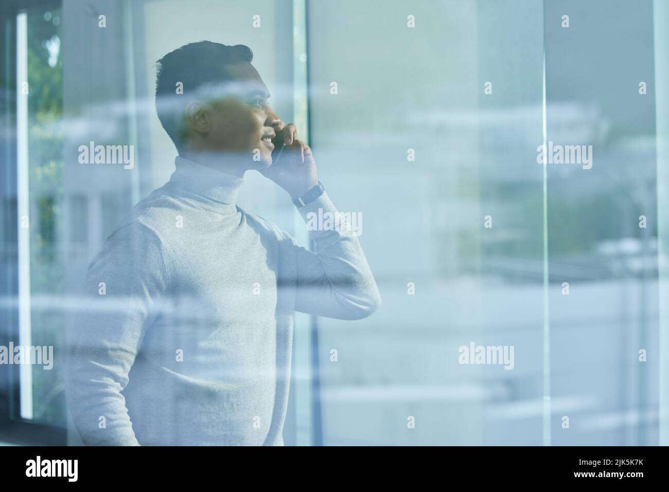 I think this is the one for me. a young man on call at home Stock Photo ...