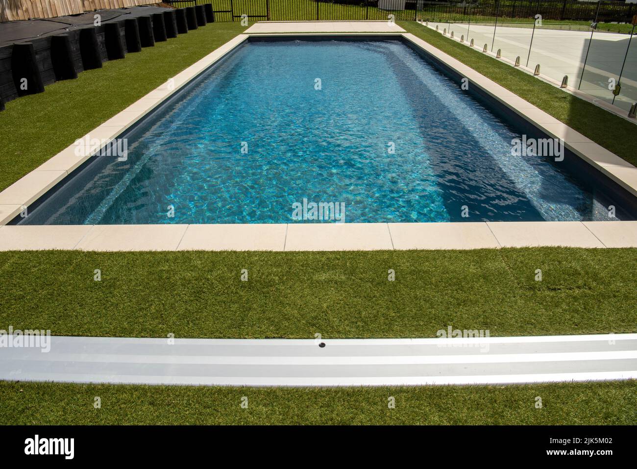 Back yard swimming pool Stock Photo - Alamy