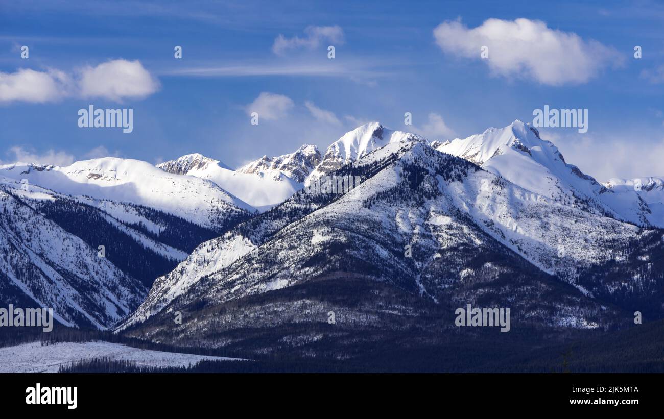 Snow covered mountain peaks in the Kootenay rockies near Golden ...