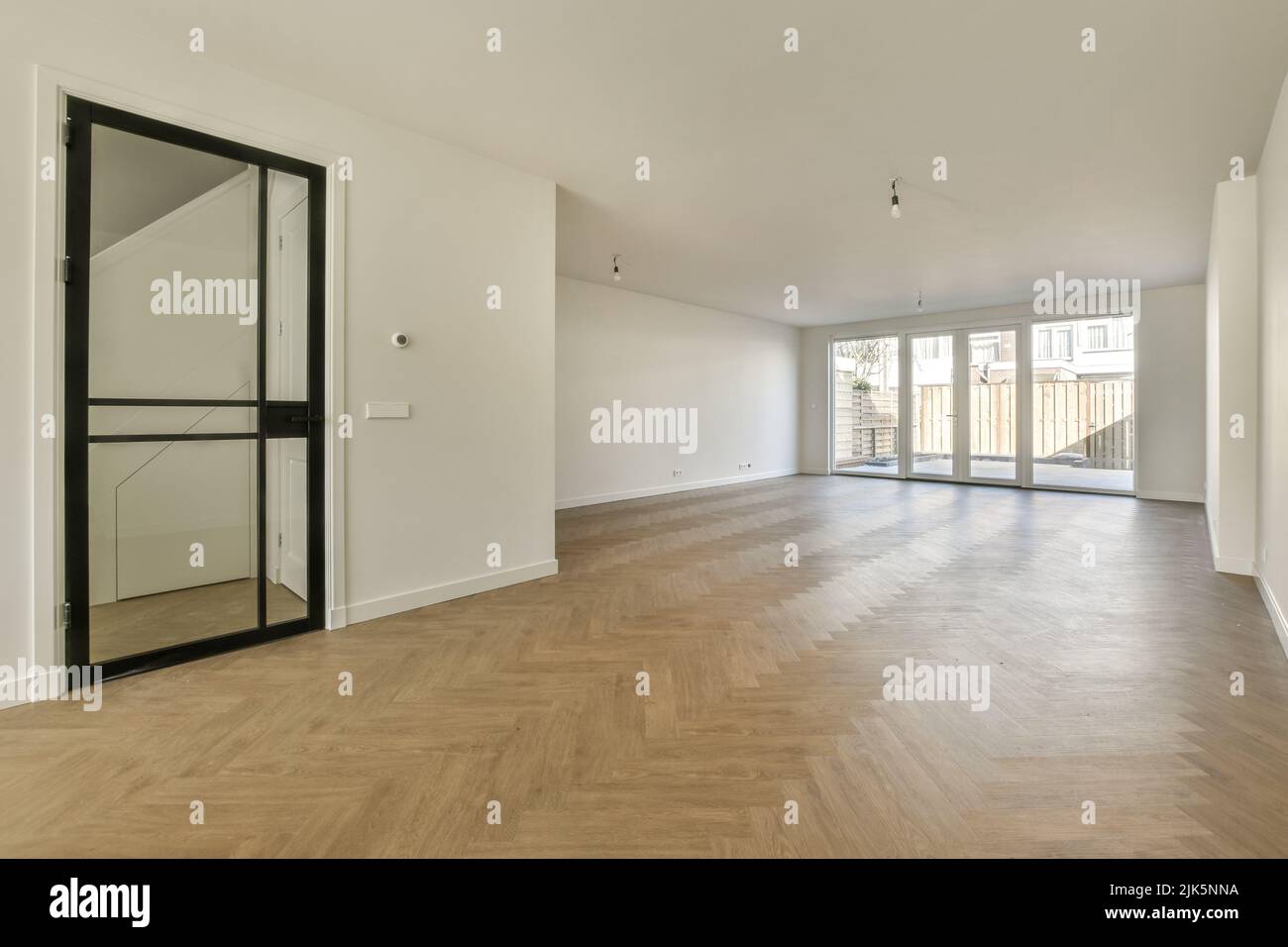 A cozy and spacious empty room in a luxury house Stock Photo - Alamy