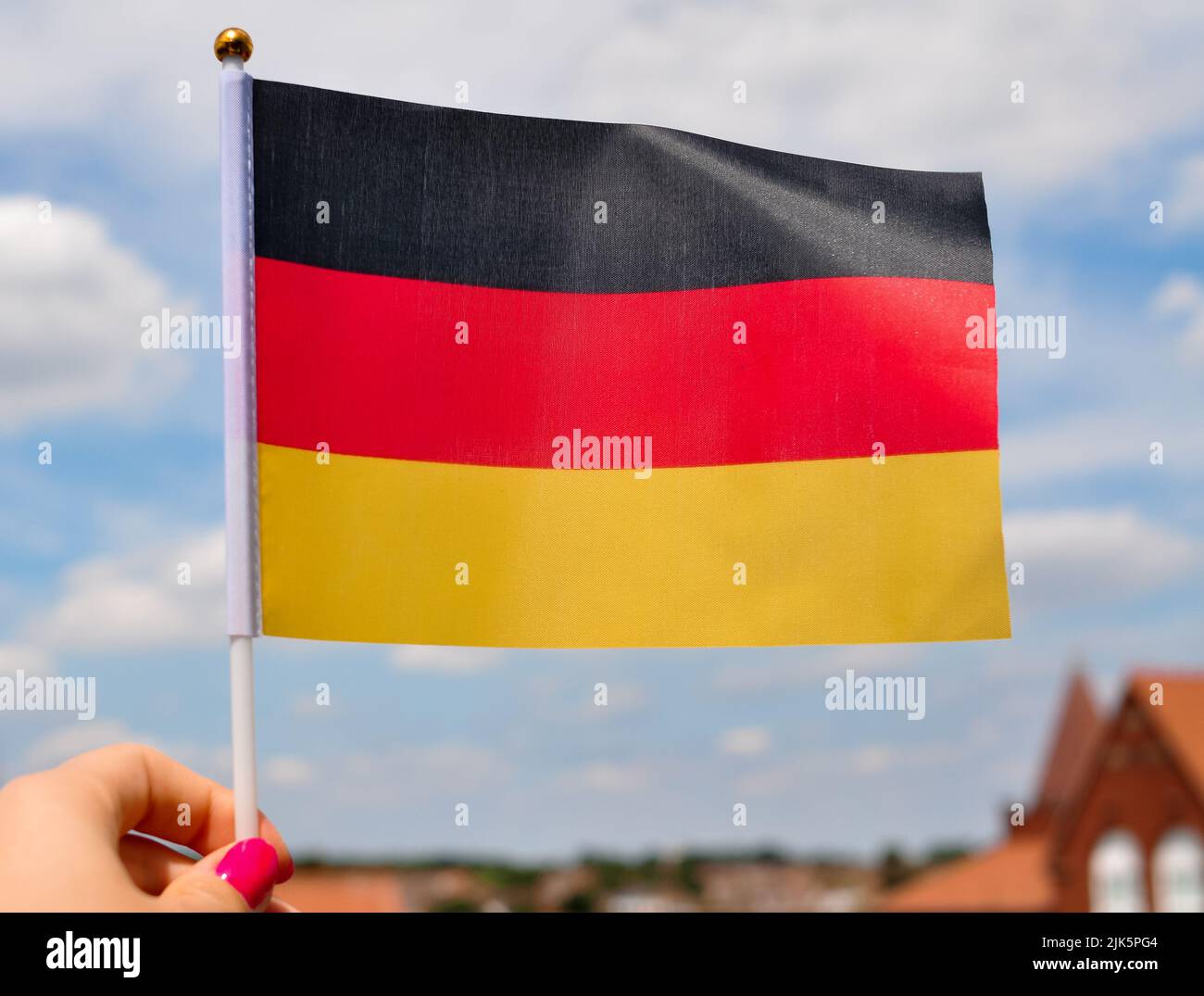 close up of national flag of germany black red and yellow colors ...