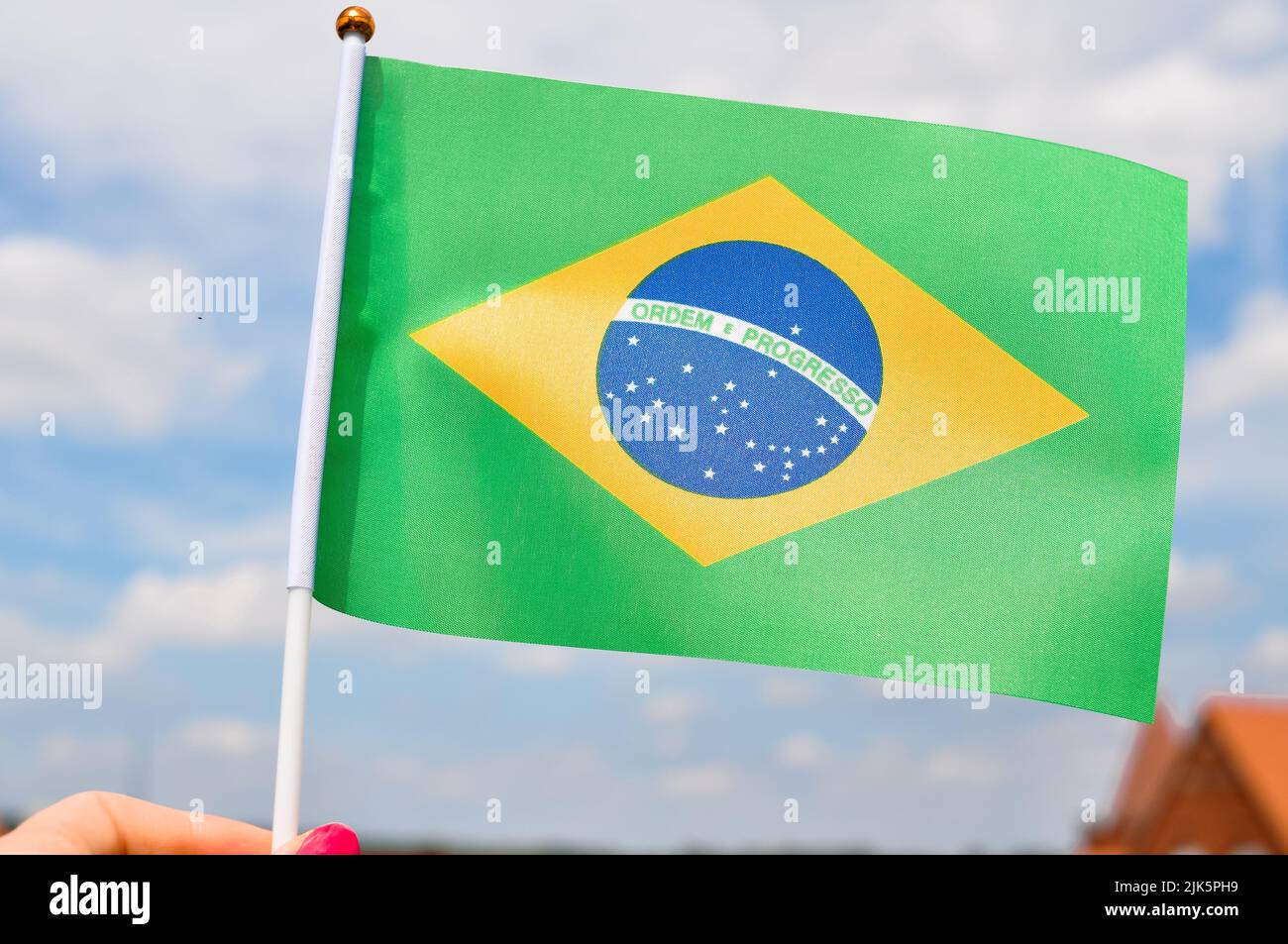 Blue sky background with brazil flag hi-res stock photography and ...