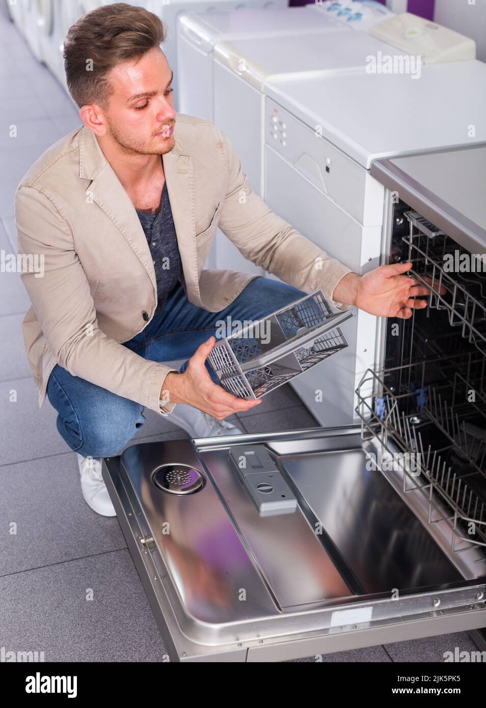 Selecting washing machine hi-res stock photography and images - Alamy