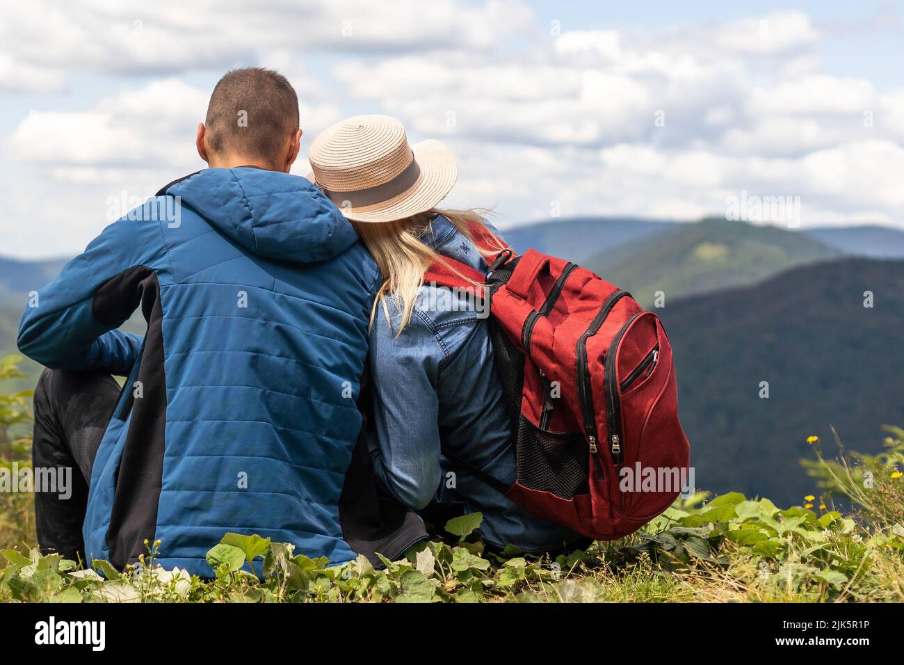 beautiful young couple enjoying nature at mountain Stock Photo - Alamy