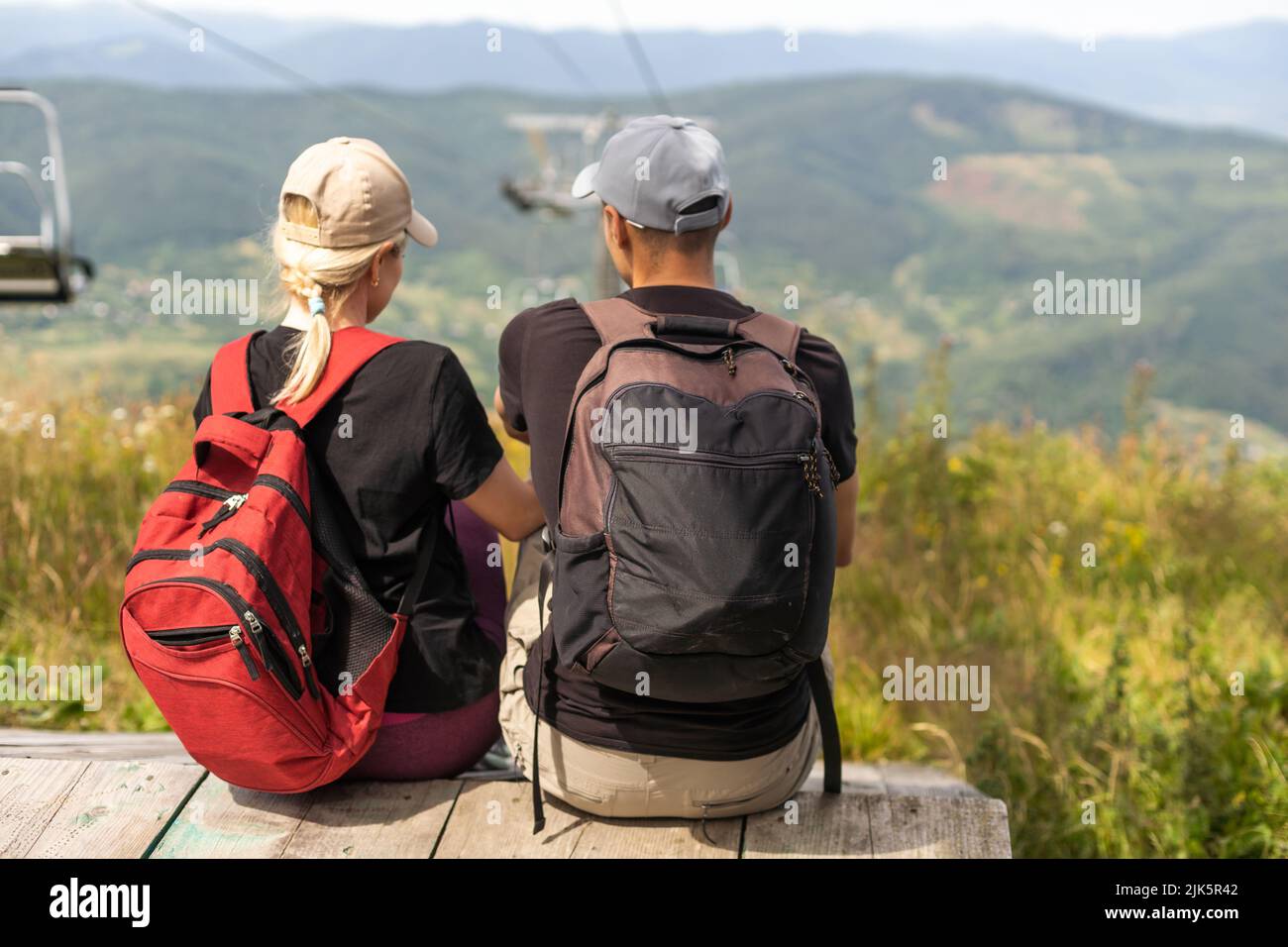 beautiful young couple enjoying nature at mountain Stock Photo - Alamy
