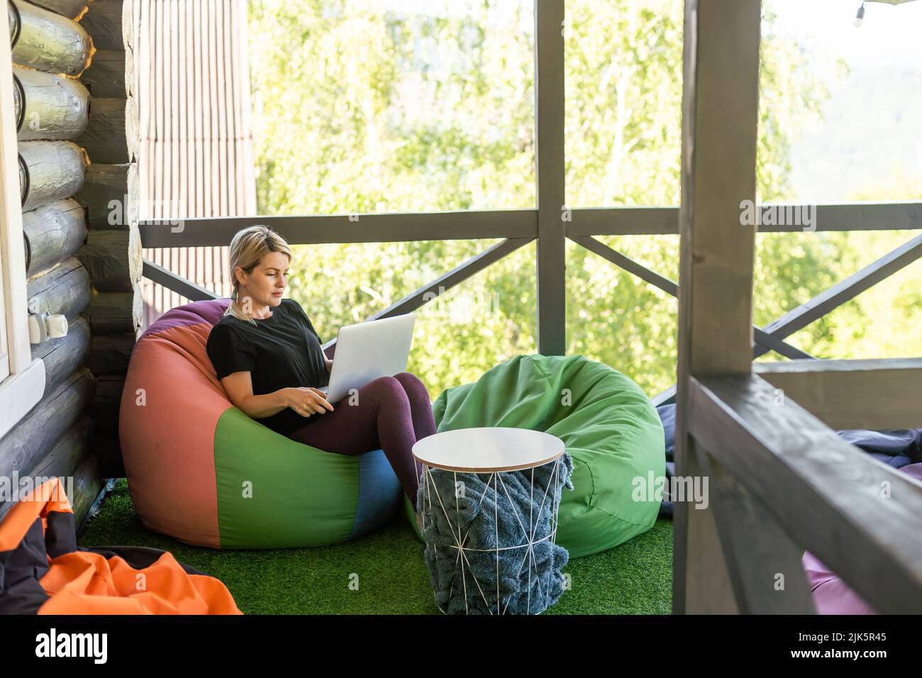 Work from home or study online, concept with a woman working at laptop ...