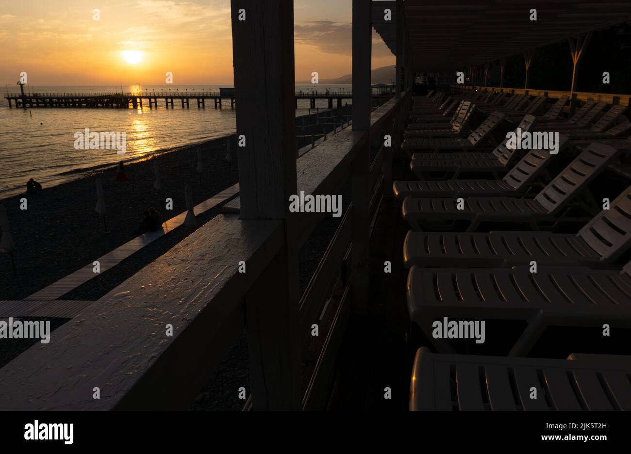 LAZAREVSKOE, SOCHI, RUSSIA - MAY, 26, 2021: Orange saturated sunset ...