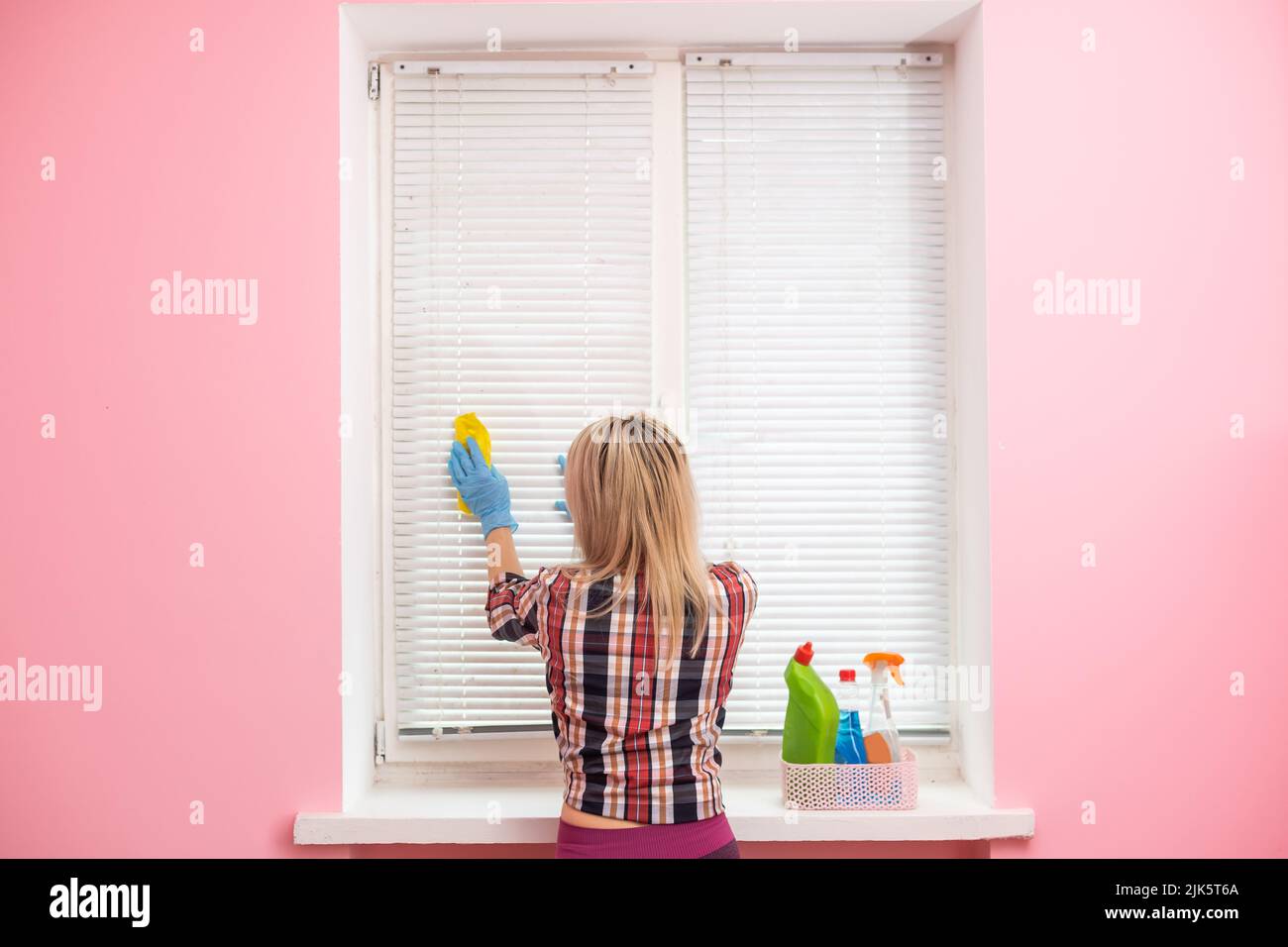 Person Professionally Cleaning Window Blinds From Dirt Stock Photo - Alamy