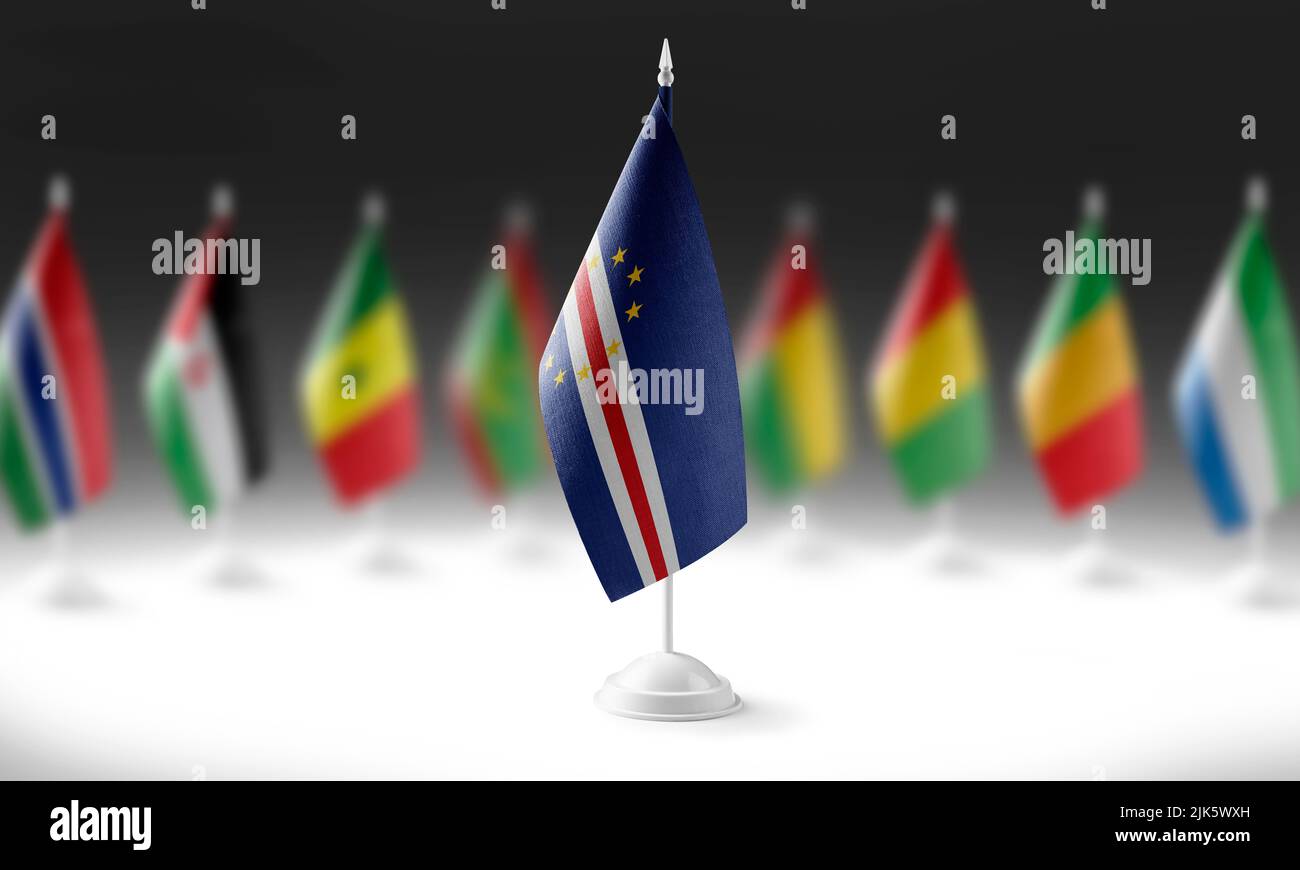 The national flag of the Cape Verde on the background of flags of other ...