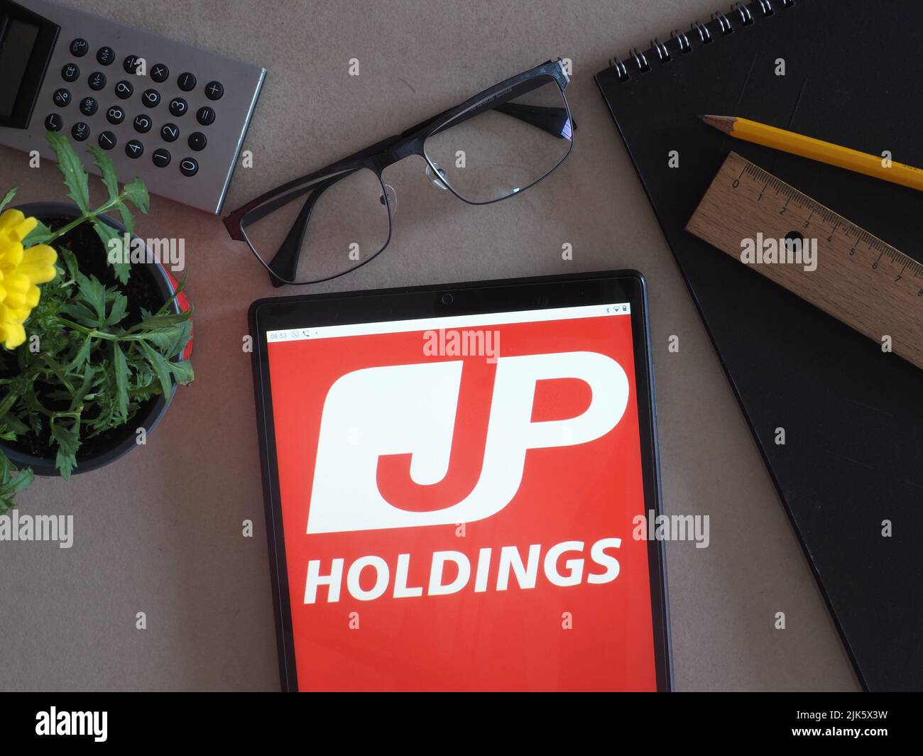 In this photo illustration, Japan Post Holdings Co., Ltd. logo seen ...