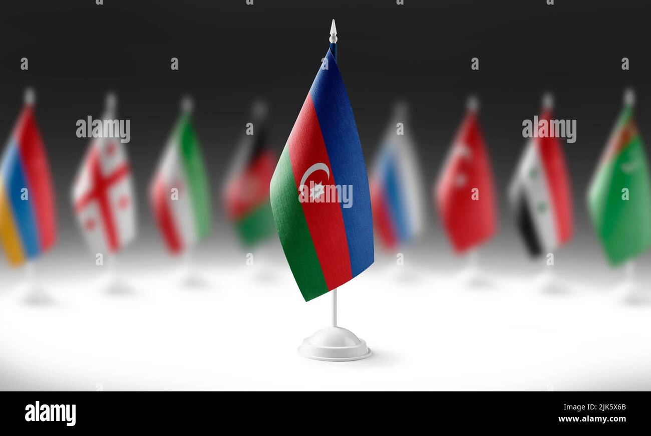 The national flag of the Azerbaijan on the background of flags of other ...