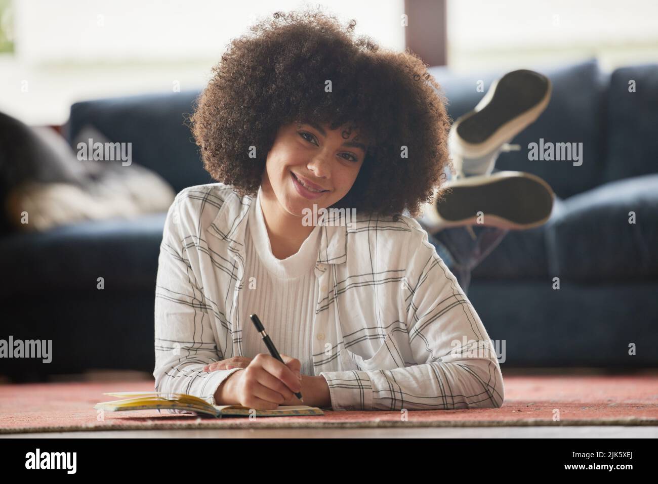 Woman laying on floor learning hi-res stock photography and images - Alamy