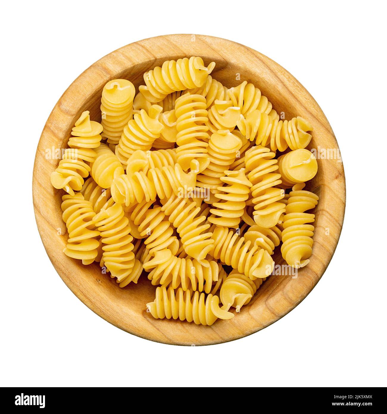 Pasta close-up. Fusilli spirale in a bowl, isolated on white background ...