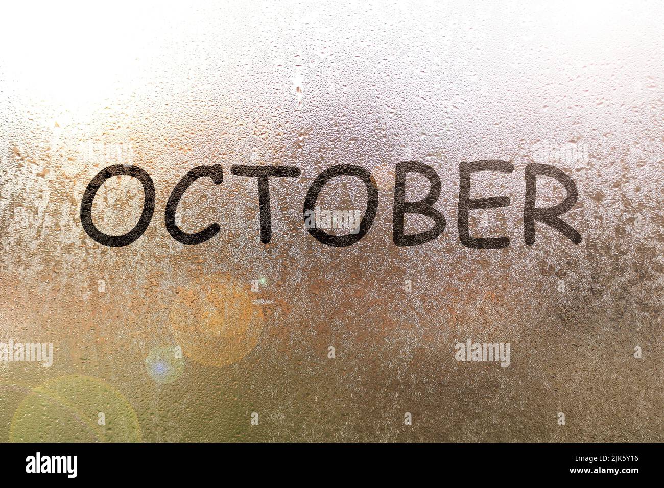 Autumn rain, the inscription on the sweaty glass - october Stock Photo ...