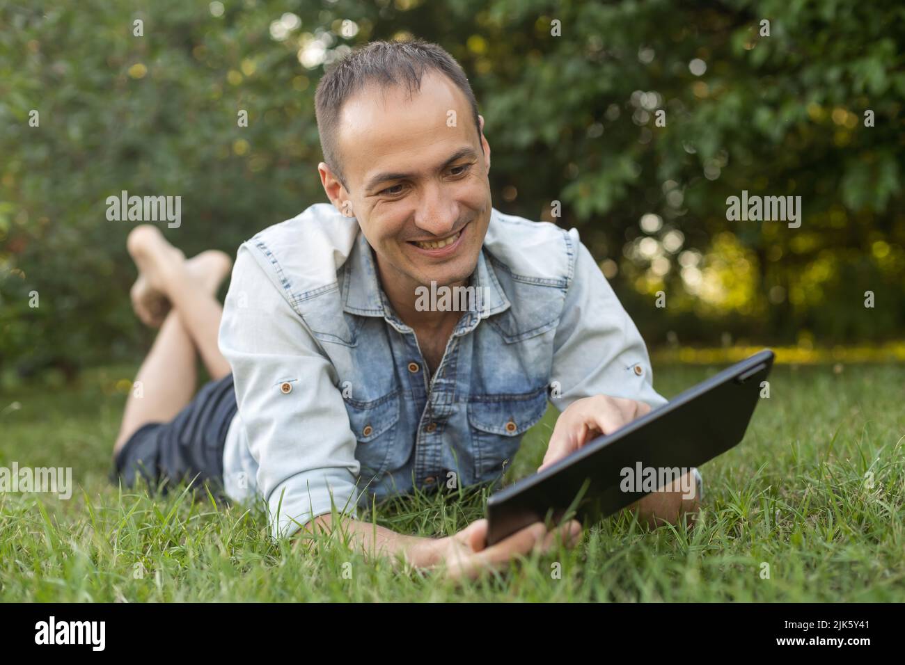 Asian man chatting friends using hi-res stock photography and images ...