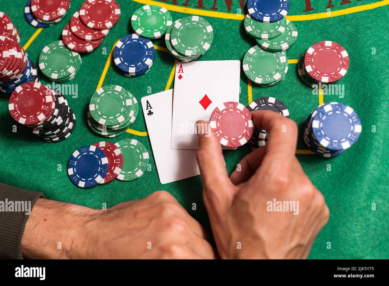 The player makes a bet in poker Stock Photo - Alamy