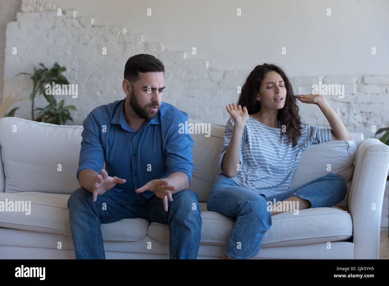 Angry couple talking in emotional conflict, arguing, shouting Stock ...