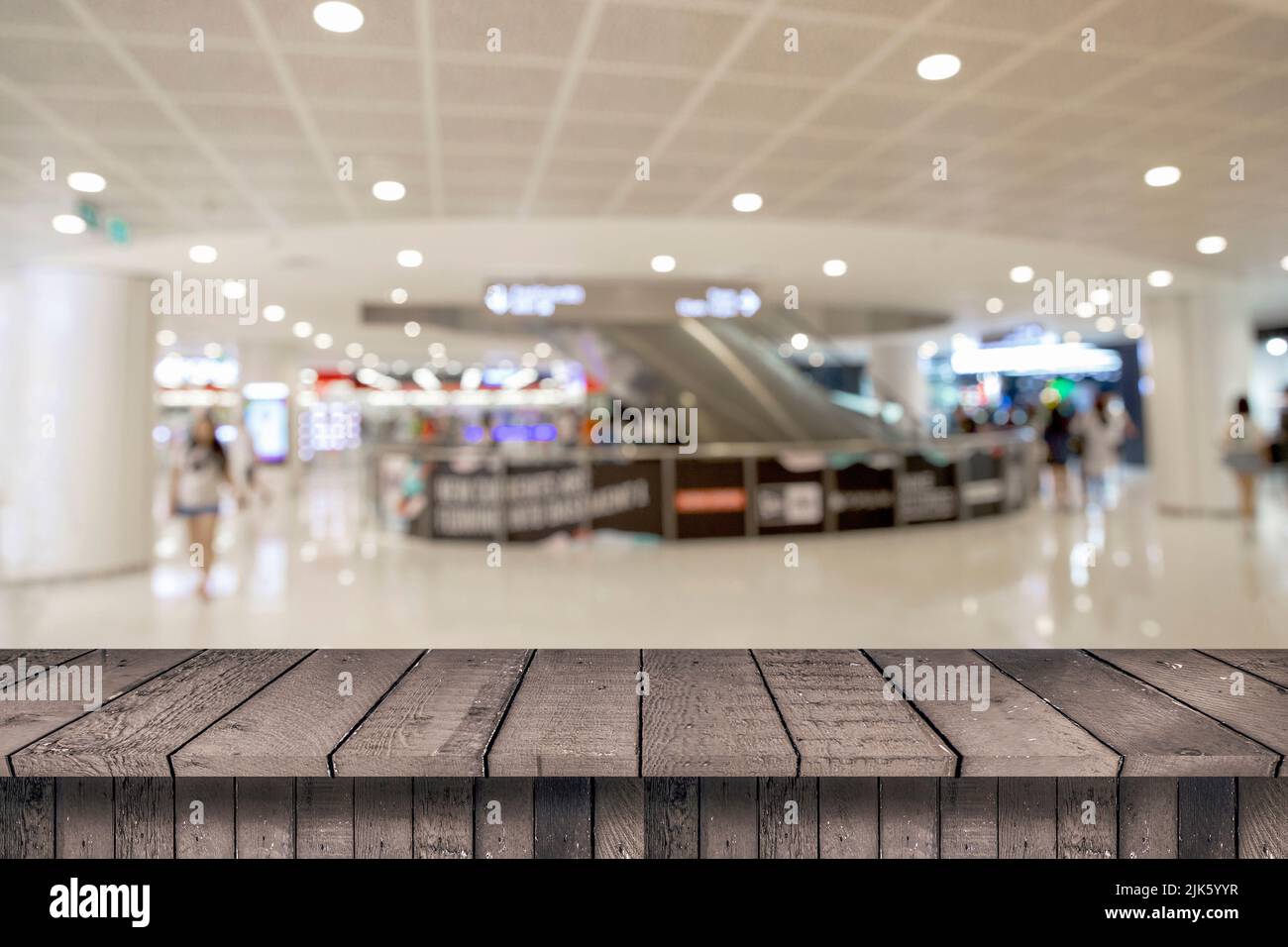 Empty top wood shelves and blurred shopping mall background. product ...