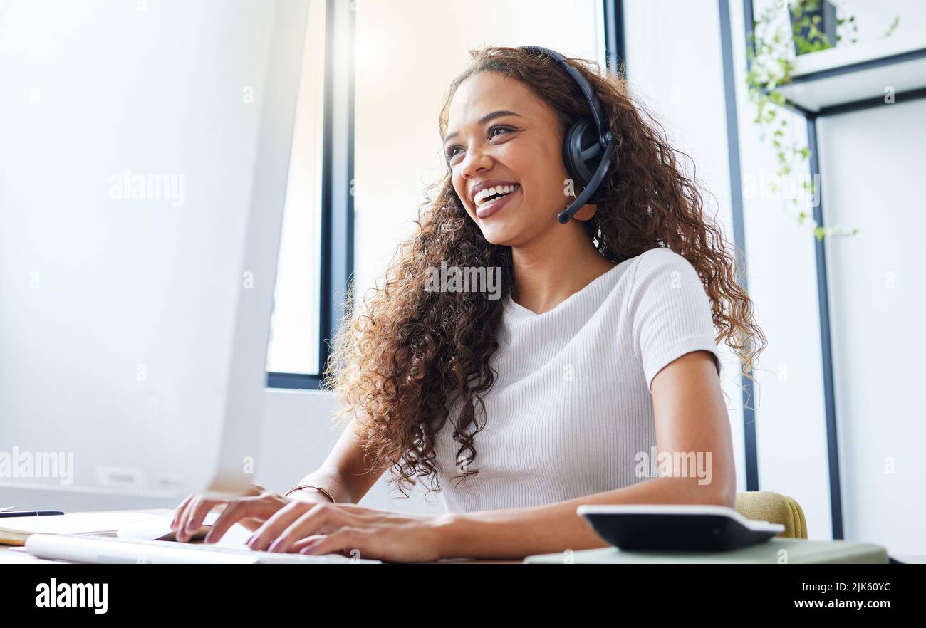 Thank you for being so kind. a young businesswoman working in a call ...