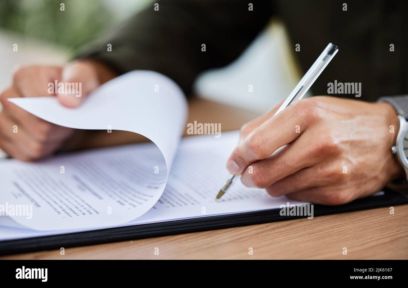 Have you double checked everything before signing. Closeup shot of an ...
