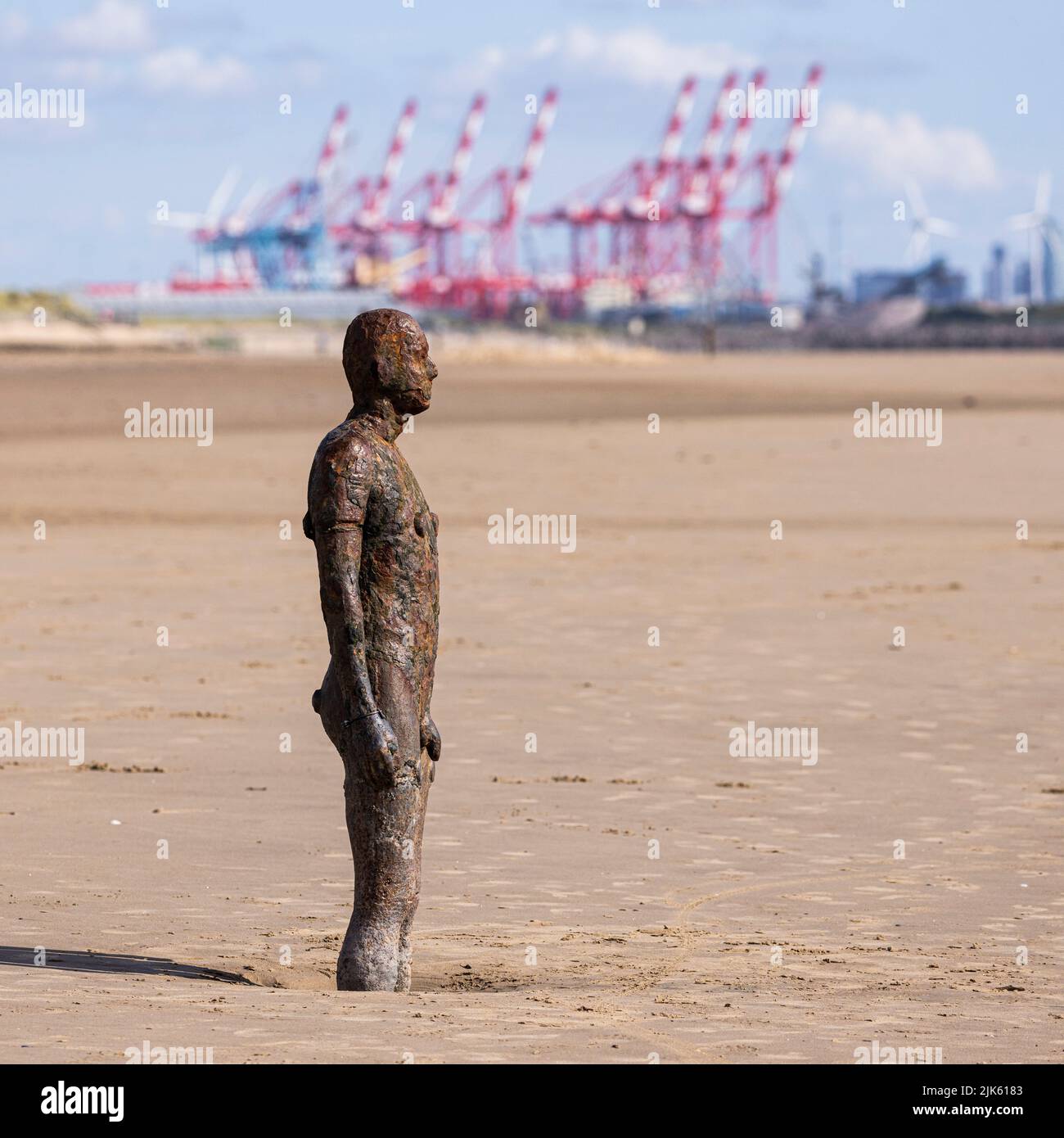 Another Place by Antony Gormley on Crosby Beach at low tide with ...