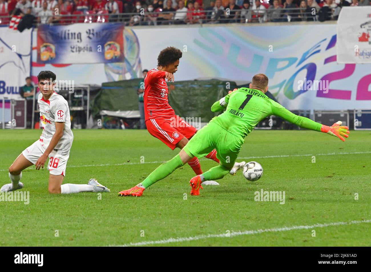Leipzig, Deutschland. 30th July, 2022. Leroy SANE (FC Bayern Munich) shoots the goal to make it ...