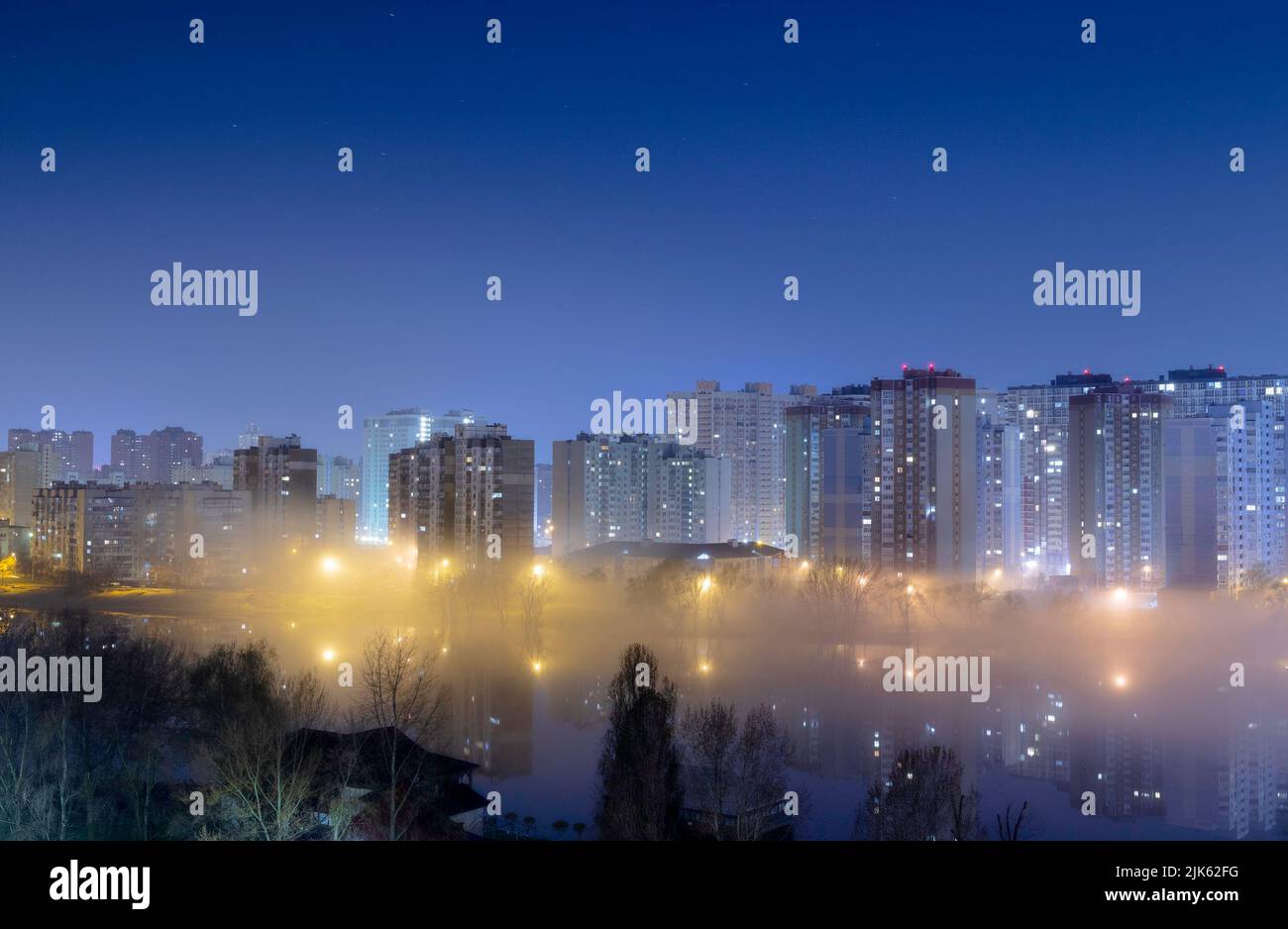 Night cityscape of the big city. Awesome bright, multi colored light in ...