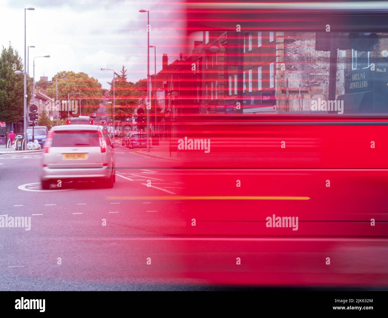 Moving Red Bus Stock Photo - Alamy