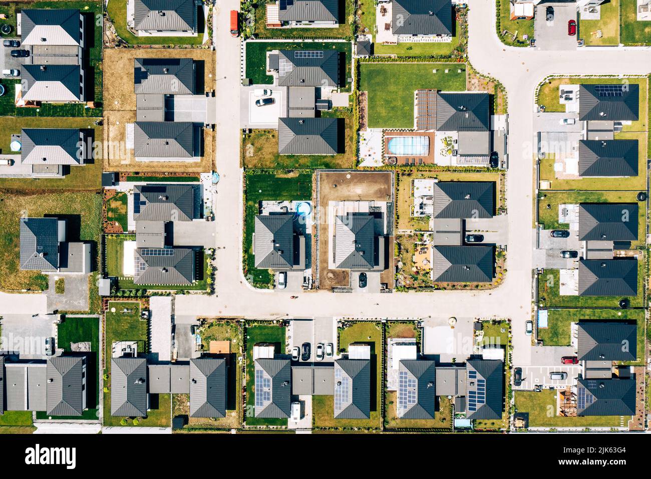 Houses aerial birds eye view. Aerial view of a typical suburb in Poland ...