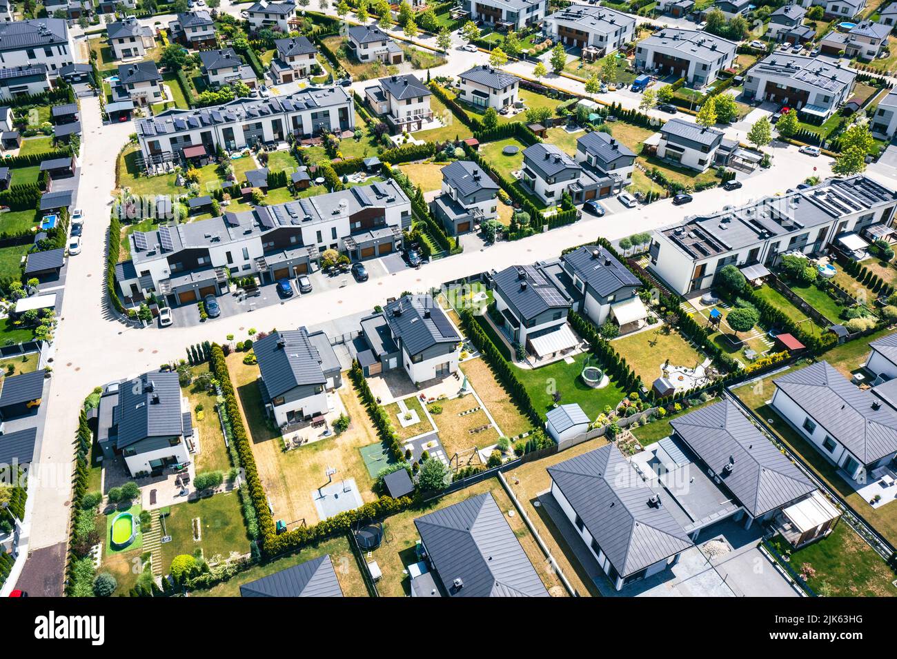 Houses aerial birds eye view. Aerial view of a typical suburb in Poland ...