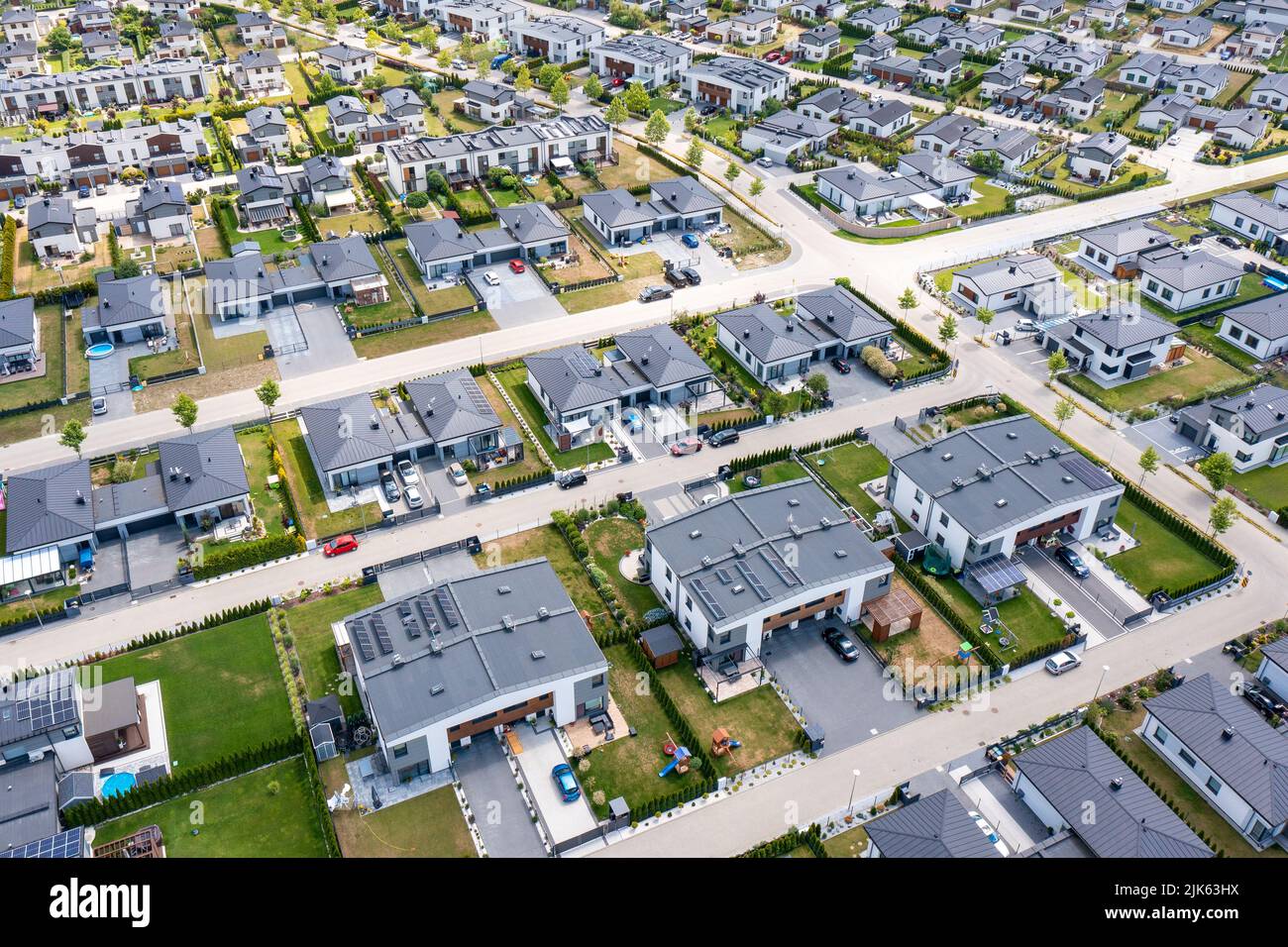 Houses aerial birds eye view. Aerial view of a typical suburb in Poland ...