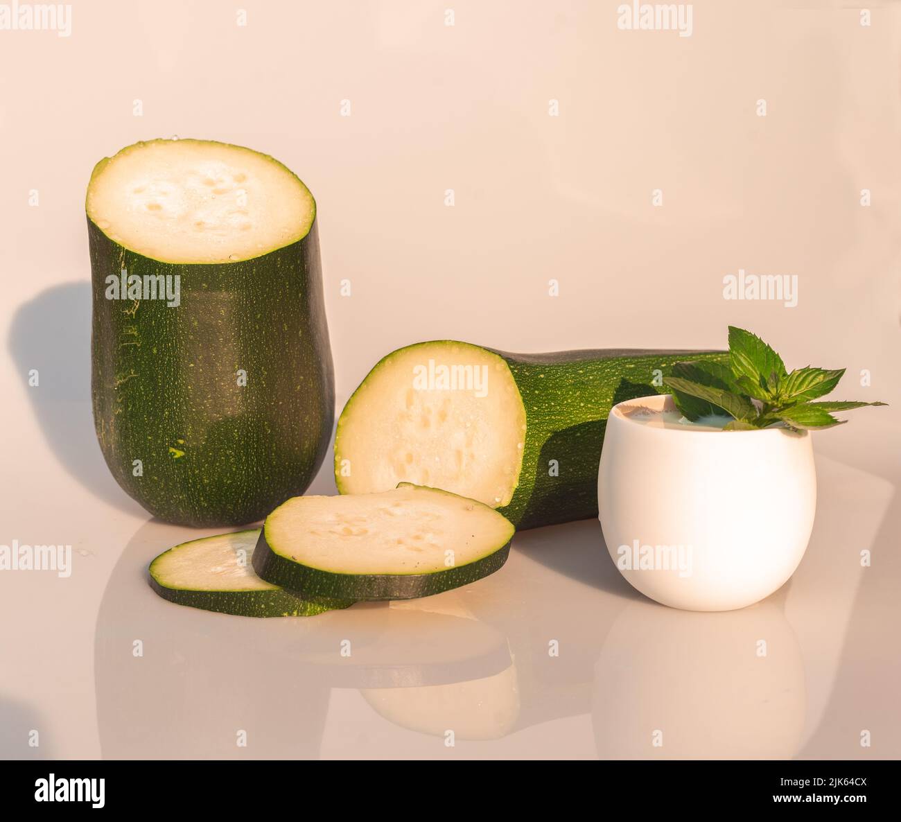 zucchini cut into halves Stock Photo - Alamy