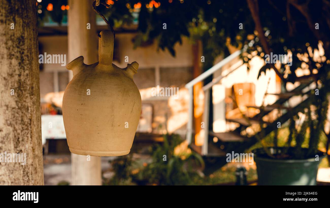 botijo in the sun on a white background Stock Photo - Alamy