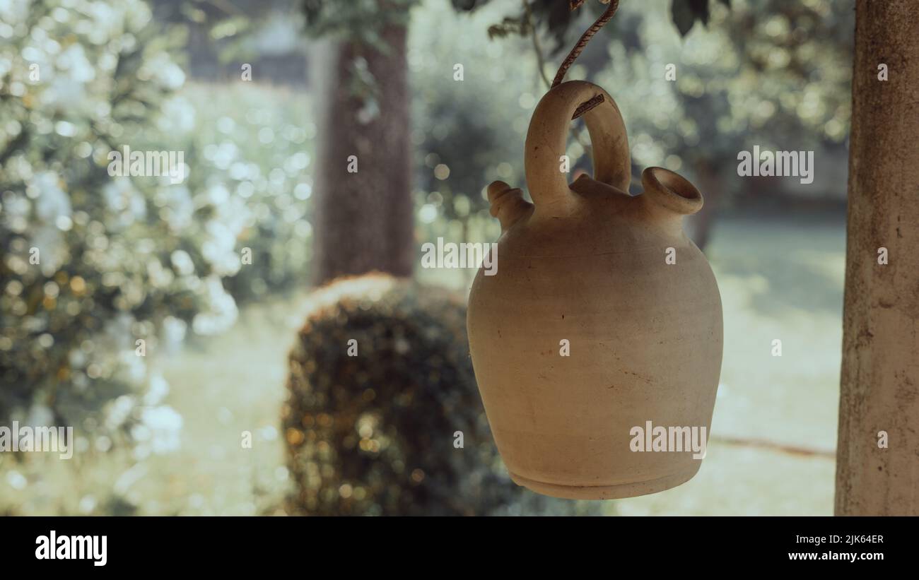 botijo in the sun on a white background Stock Photo - Alamy