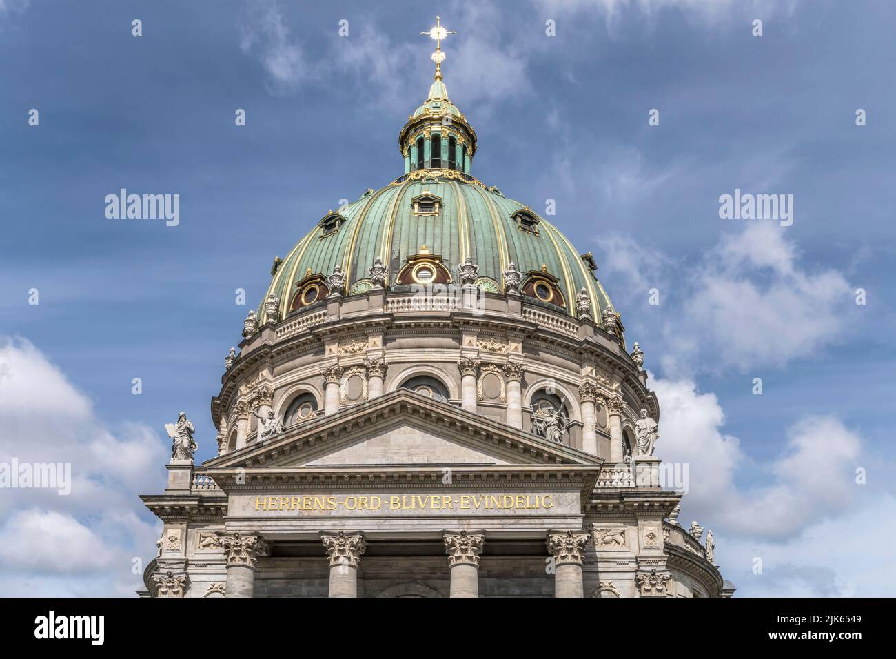 cityscape with Marble church gable and dome, shot in bright light at ...