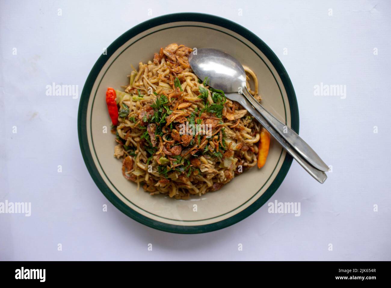 "Mie Goreng Jawa or bakmi jawa or java noodle with spoon and fork ...
