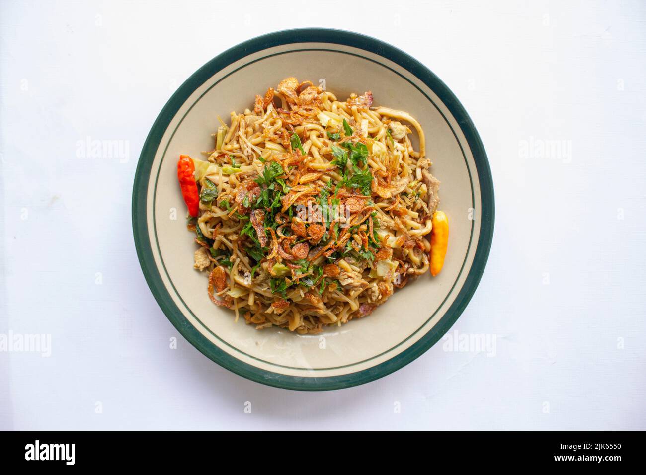 "Mie Goreng Jawa or bakmi jawa or java noodle with spoon and fork ...
