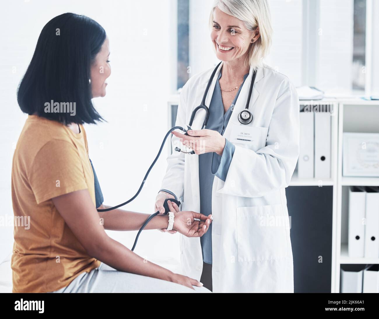 Your pressure is well within the normal range. a doctor examining a ...