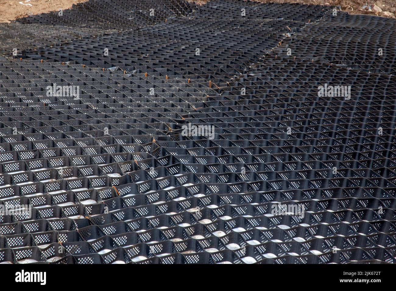 plastic reinforcement of the territory of the road construction ...