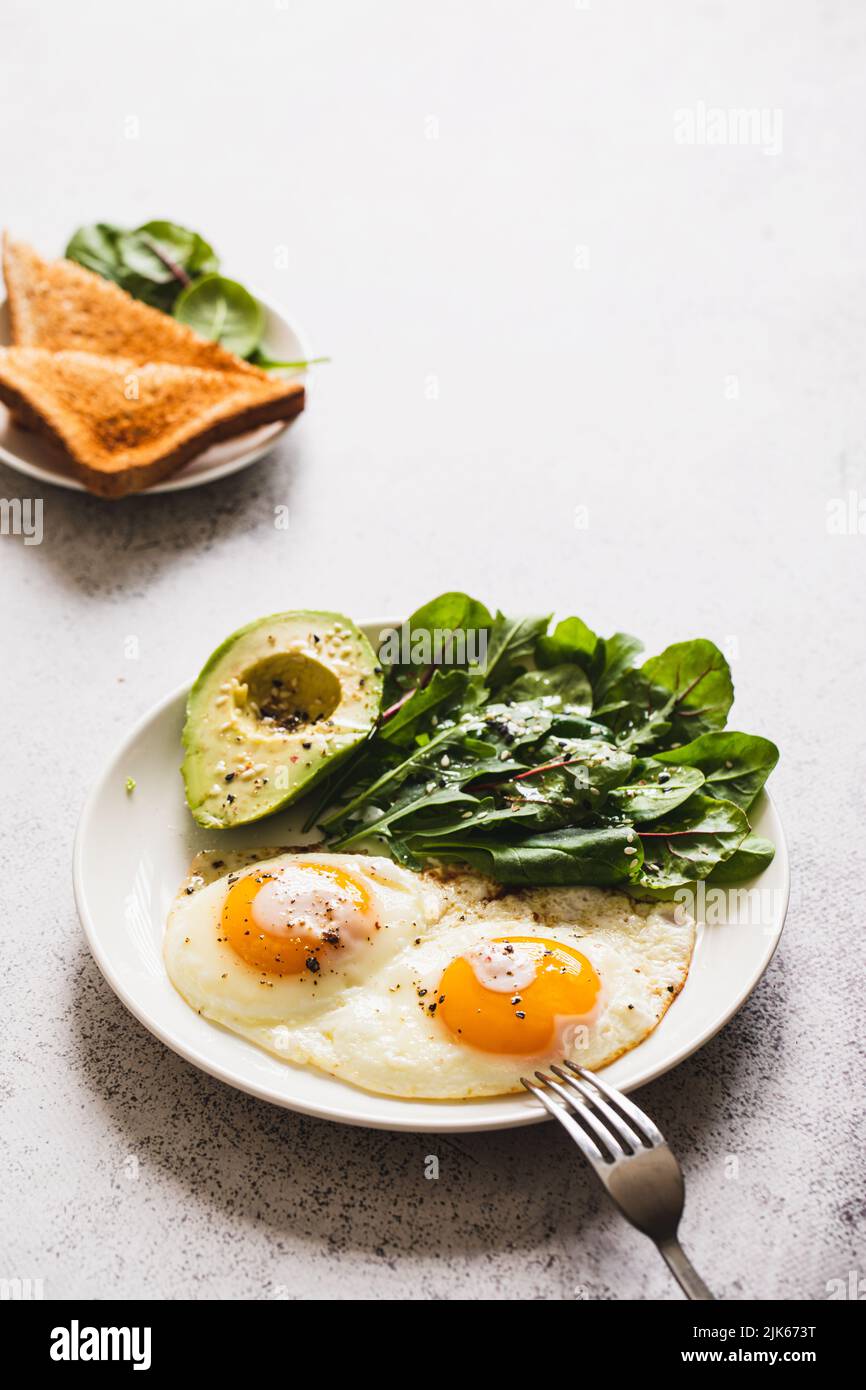 Healthy Breakfast with Wholemeal Bread Toast, Eggs with Green Salad ...